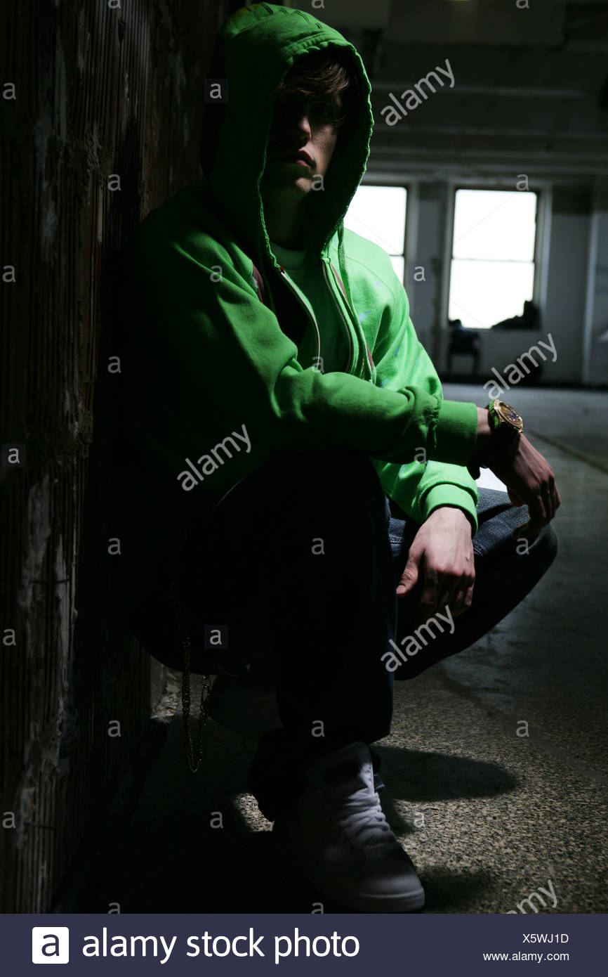 Man Crouched Down High Resolution Stock Photography and Images - Alamy