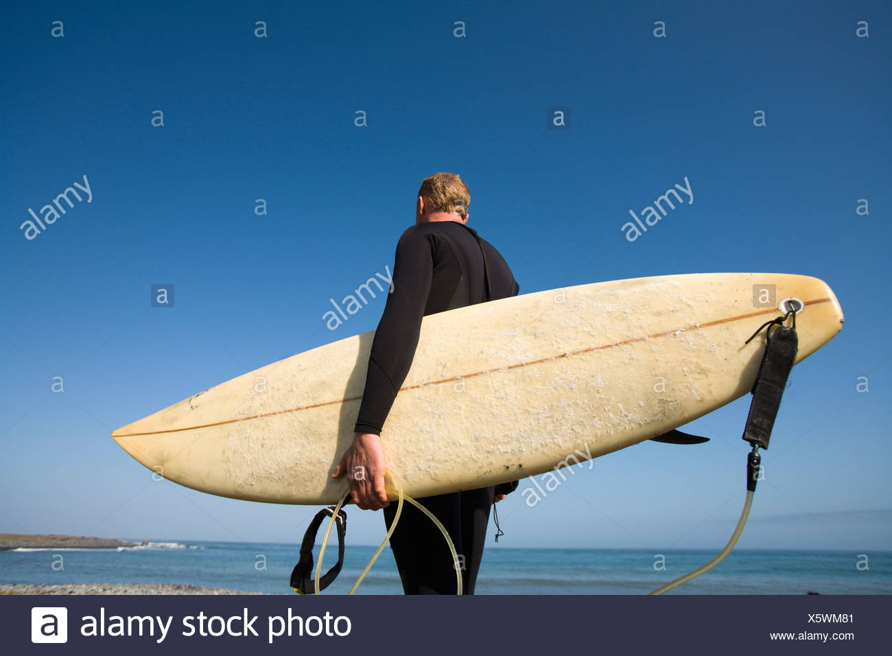 Carrying Under Arm High Resolution Stock Photography and Images - Alamy