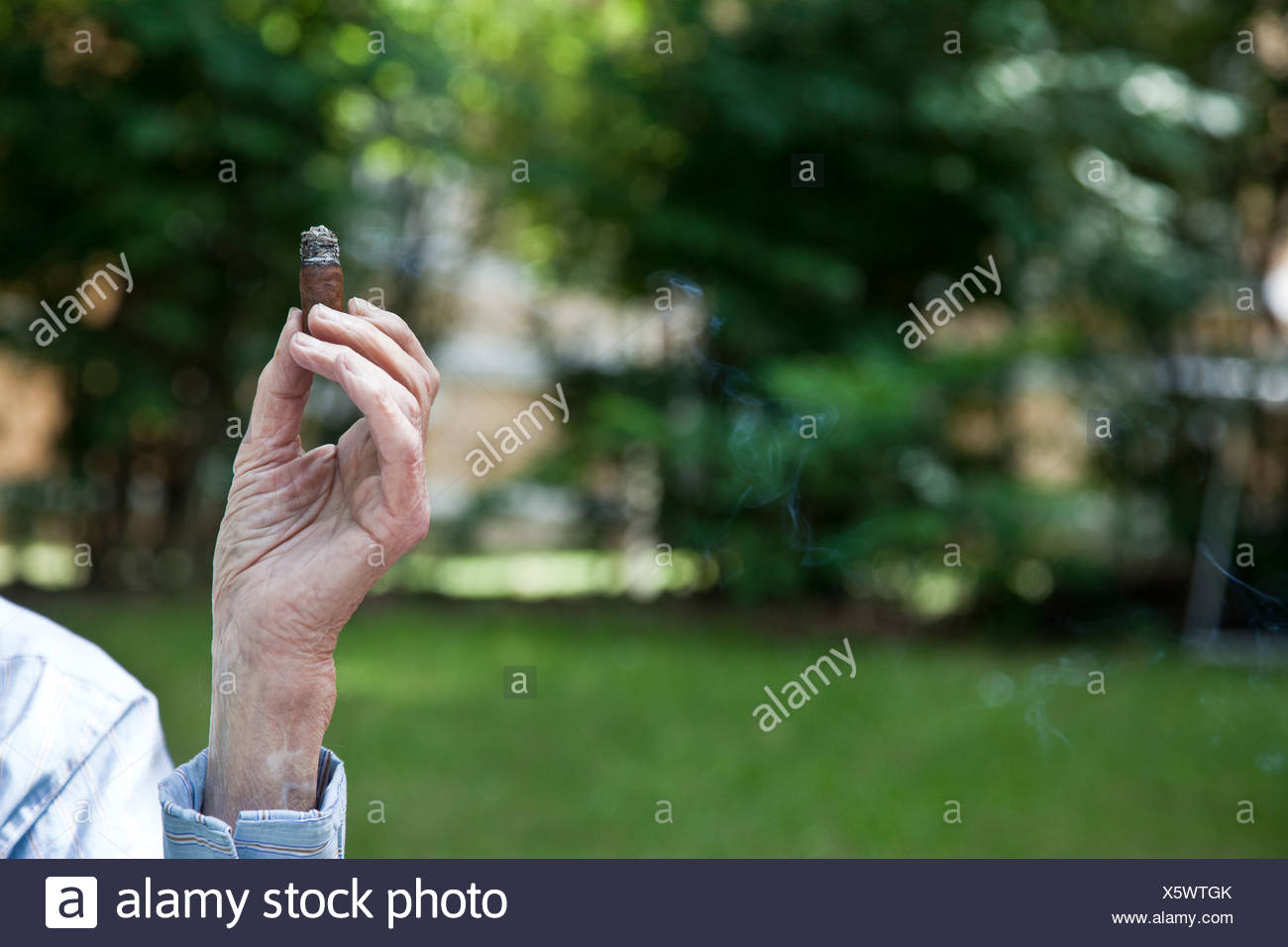 Enjoying Cigar High Resolution Stock Photography and Images - Alamy