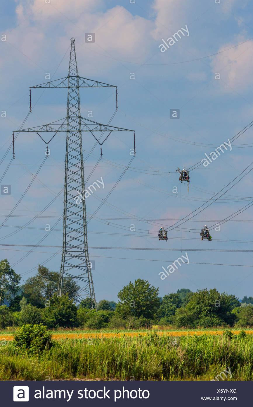 High Voltage Power Lines Maintenance High Resolution Stock Photography ...