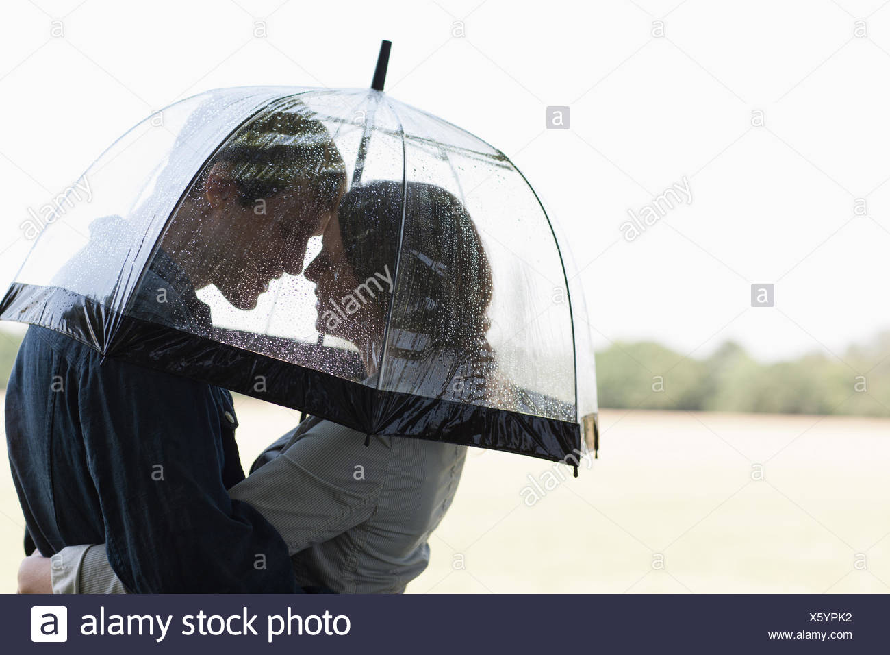 Couple And Umbrella Stock Photos & Couple And Umbrella Stock Images - Alamy
