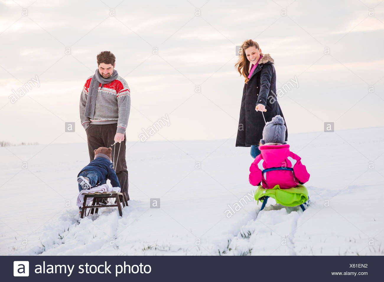 Family Sledging High Resolution Stock Photography and Images - Alamy