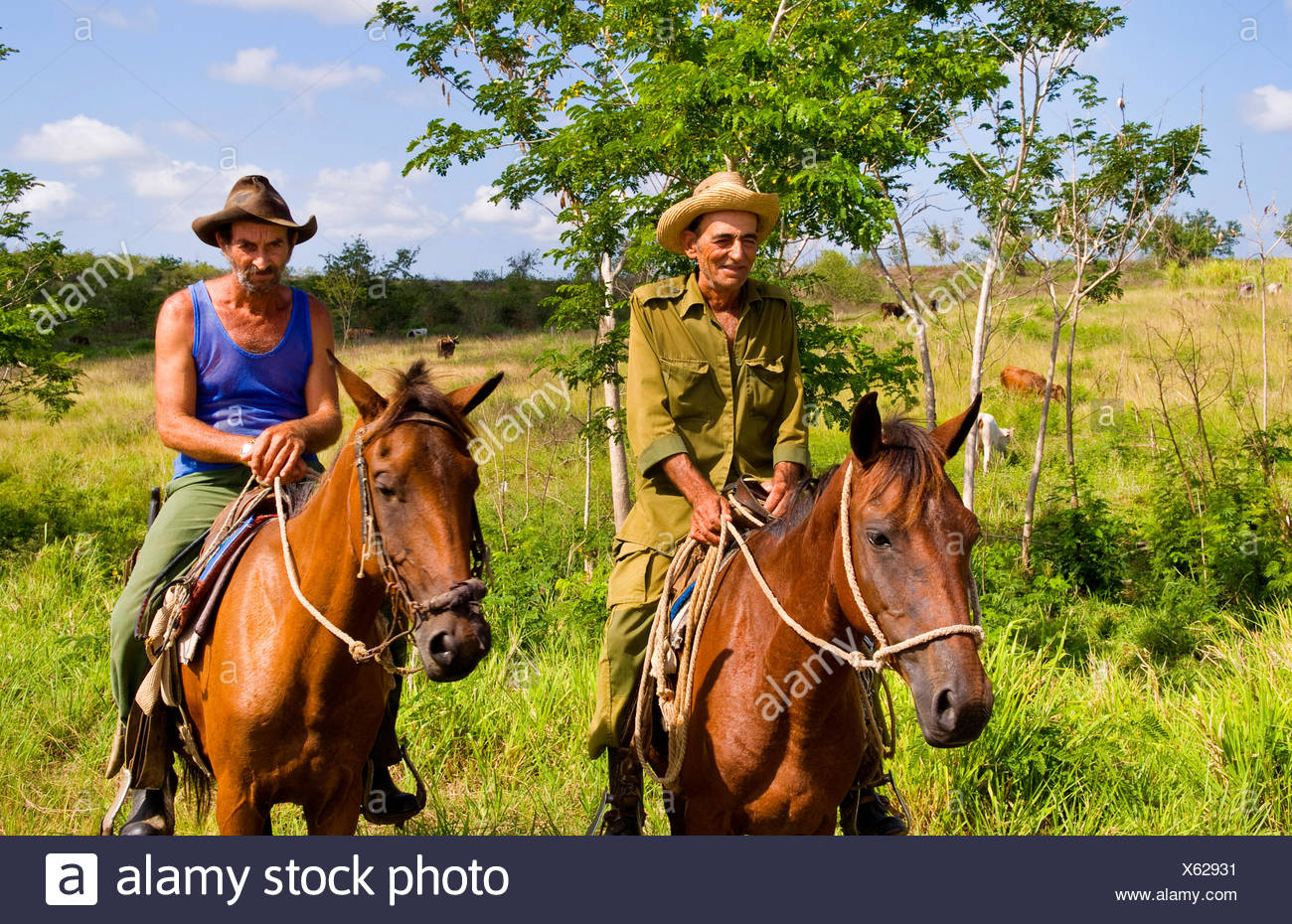 Two Cowboys Riding Horses High Resolution Stock Photography and Images ...