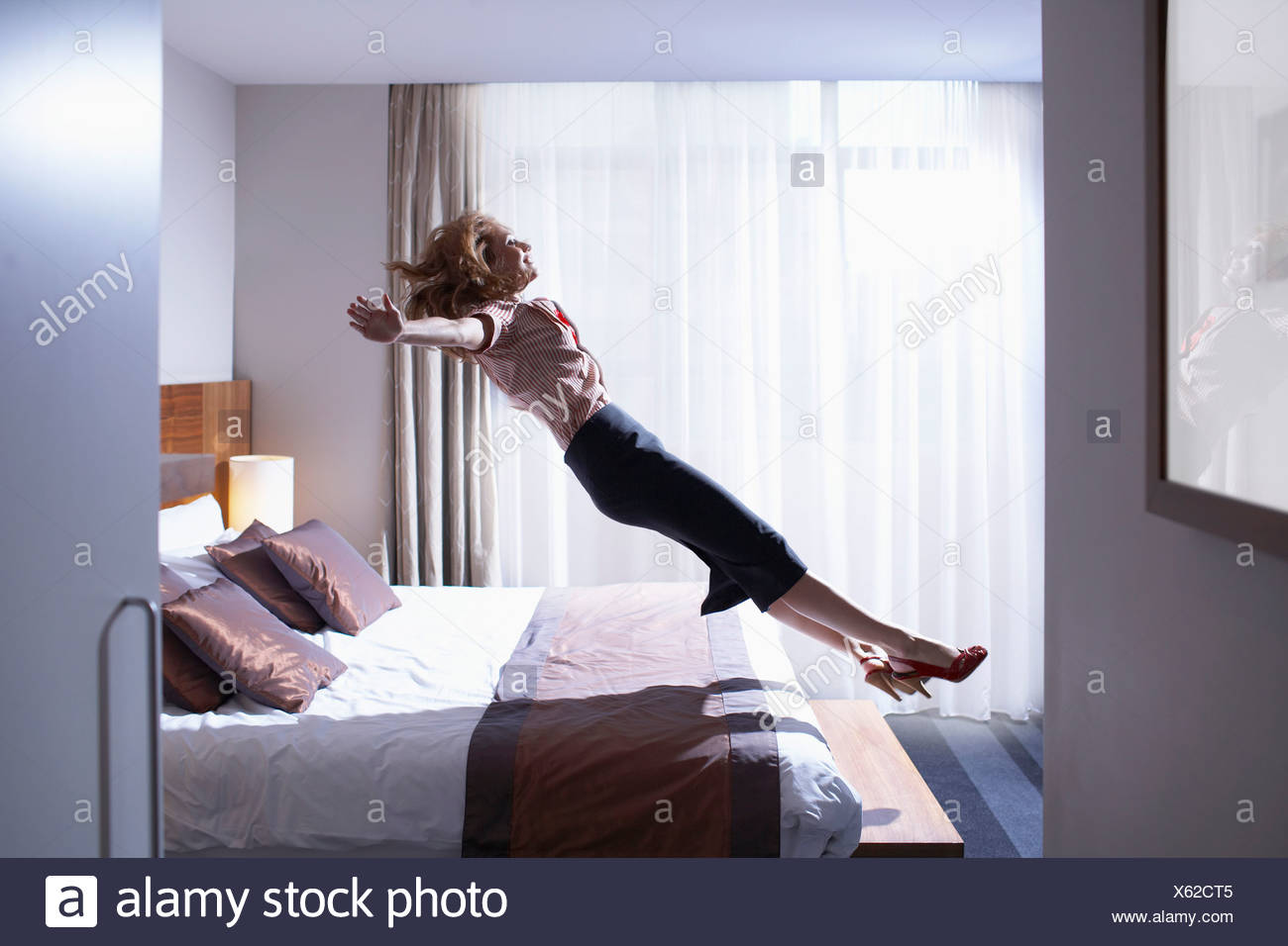 Hotel Bed Jump High Resolution Stock Photography and Images - Alamy