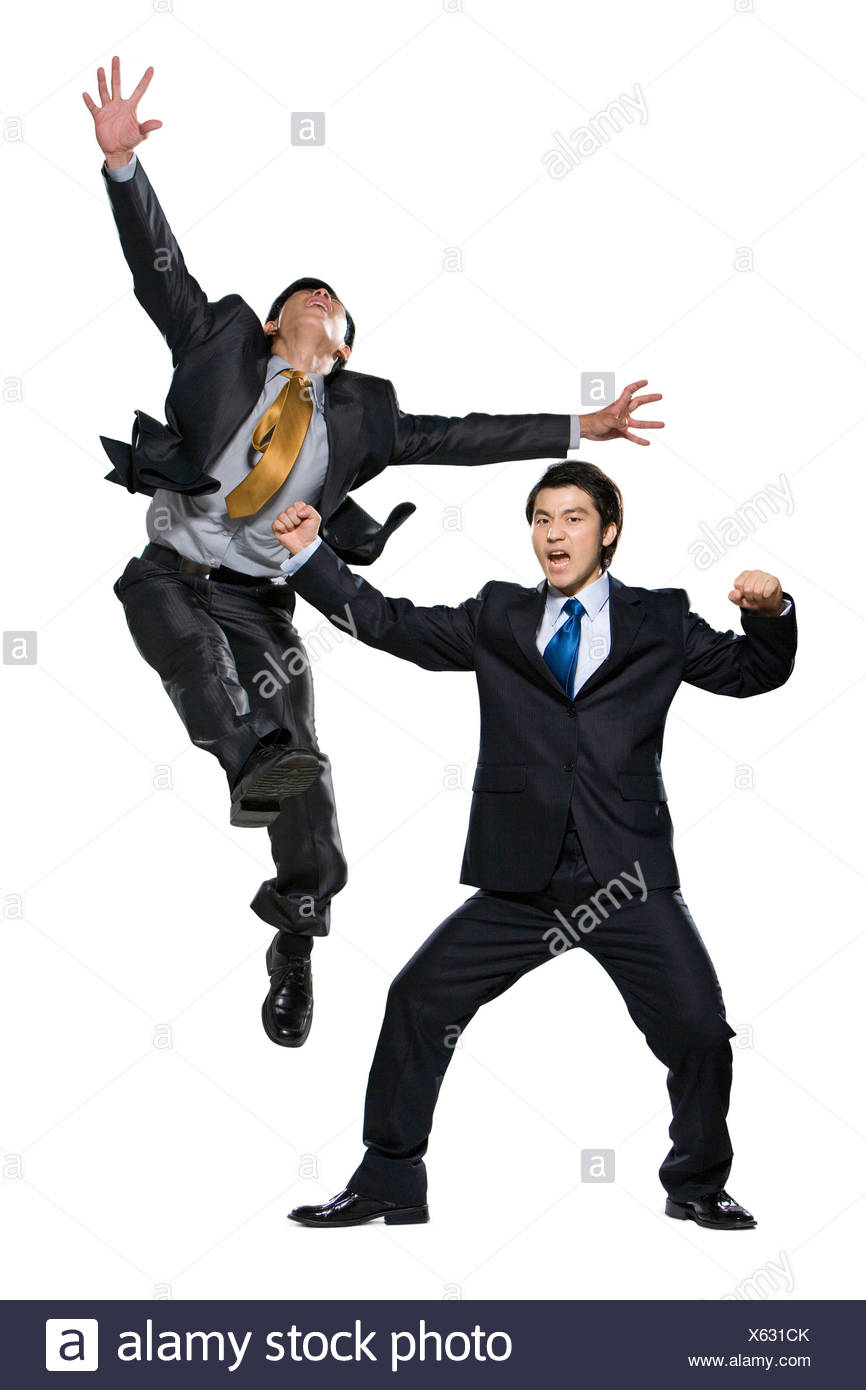 Two Men Fighting Punching Stock Photos & Two Men Fighting Punching ...
