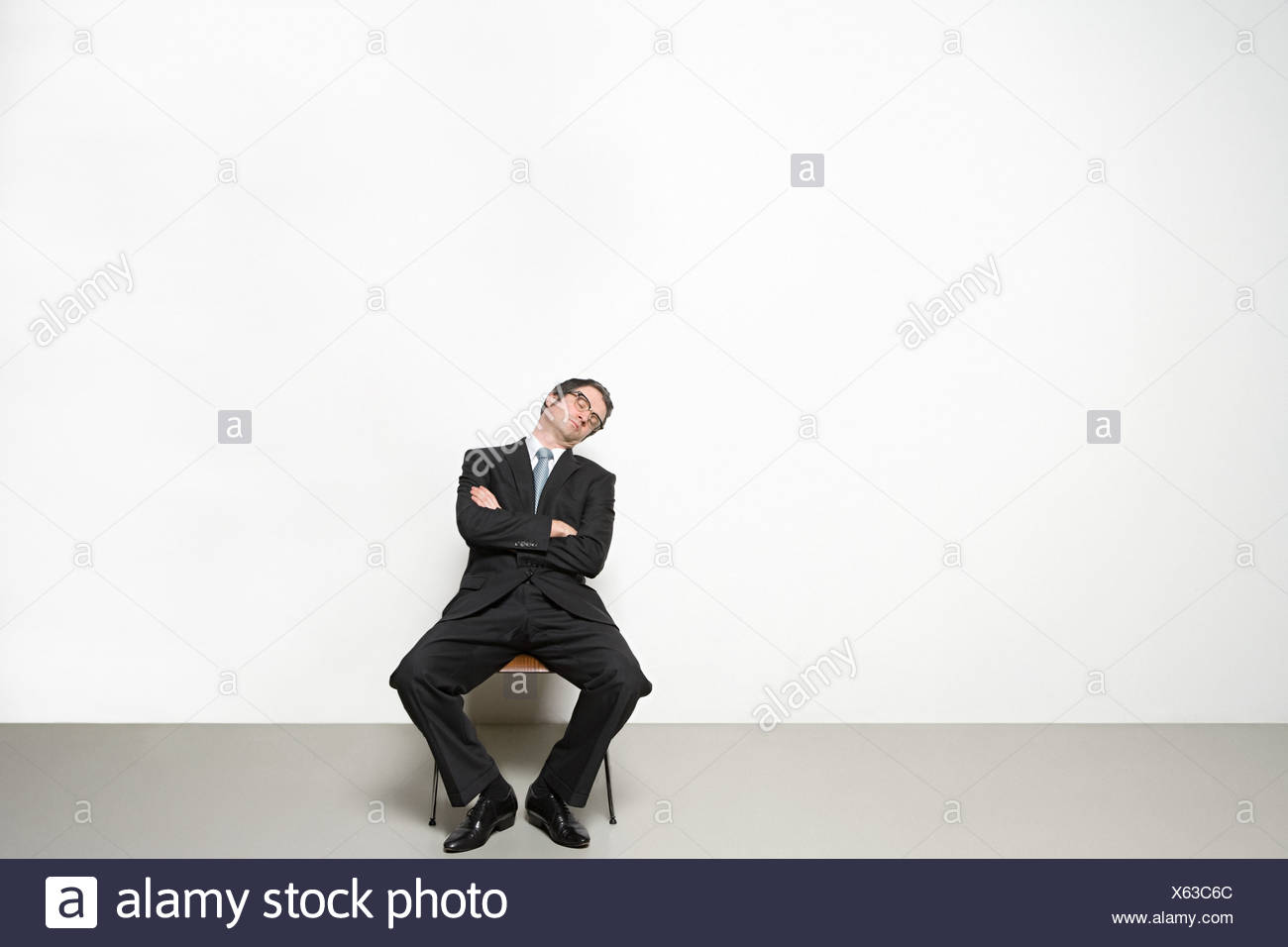 Sleeping In Chair High Resolution Stock Photography and Images - Alamy