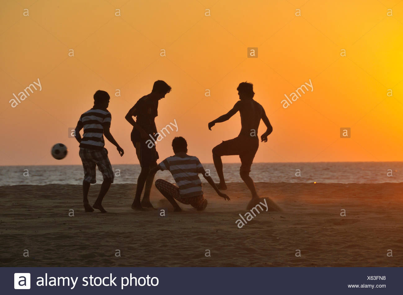 Kids Playing Beach Football High Resolution Stock Photography and ...