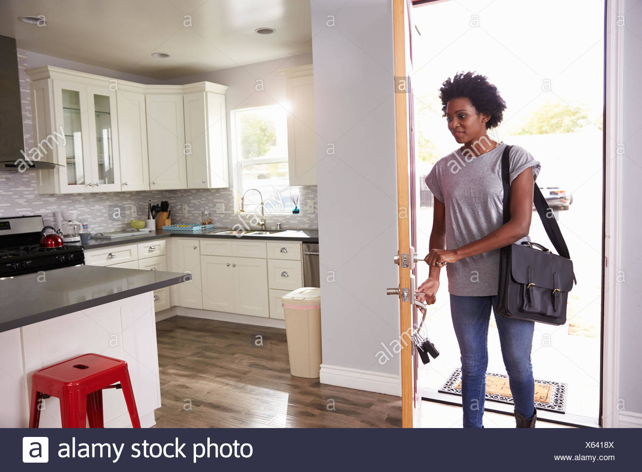 Woman Coming Home From Work High Resolution Stock Photography and ...