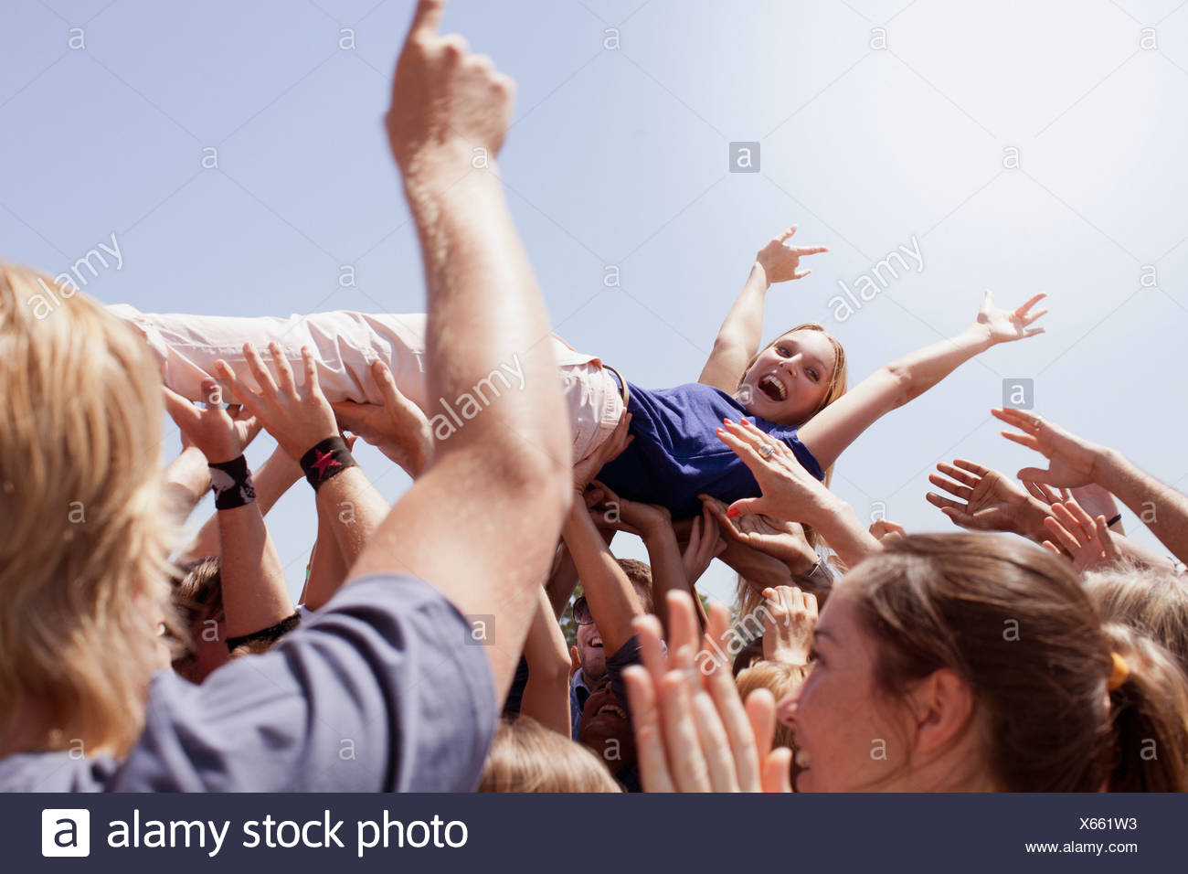 Woman Crowd Surfing Stock Photos & Woman Crowd Surfing Stock Images - Alamy