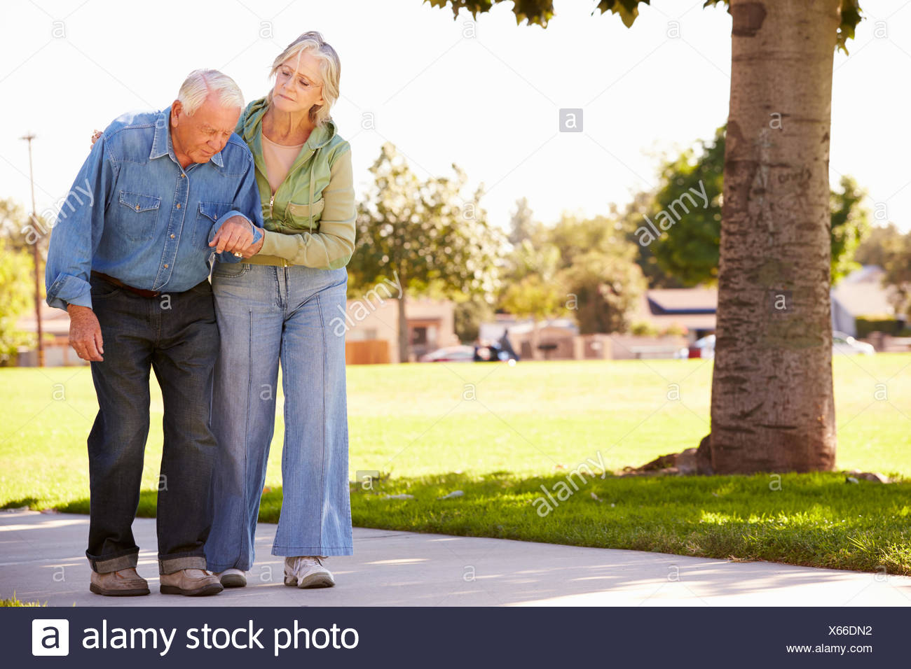 Carer Helping Senior Woman Walk High Resolution Stock Photography and ...