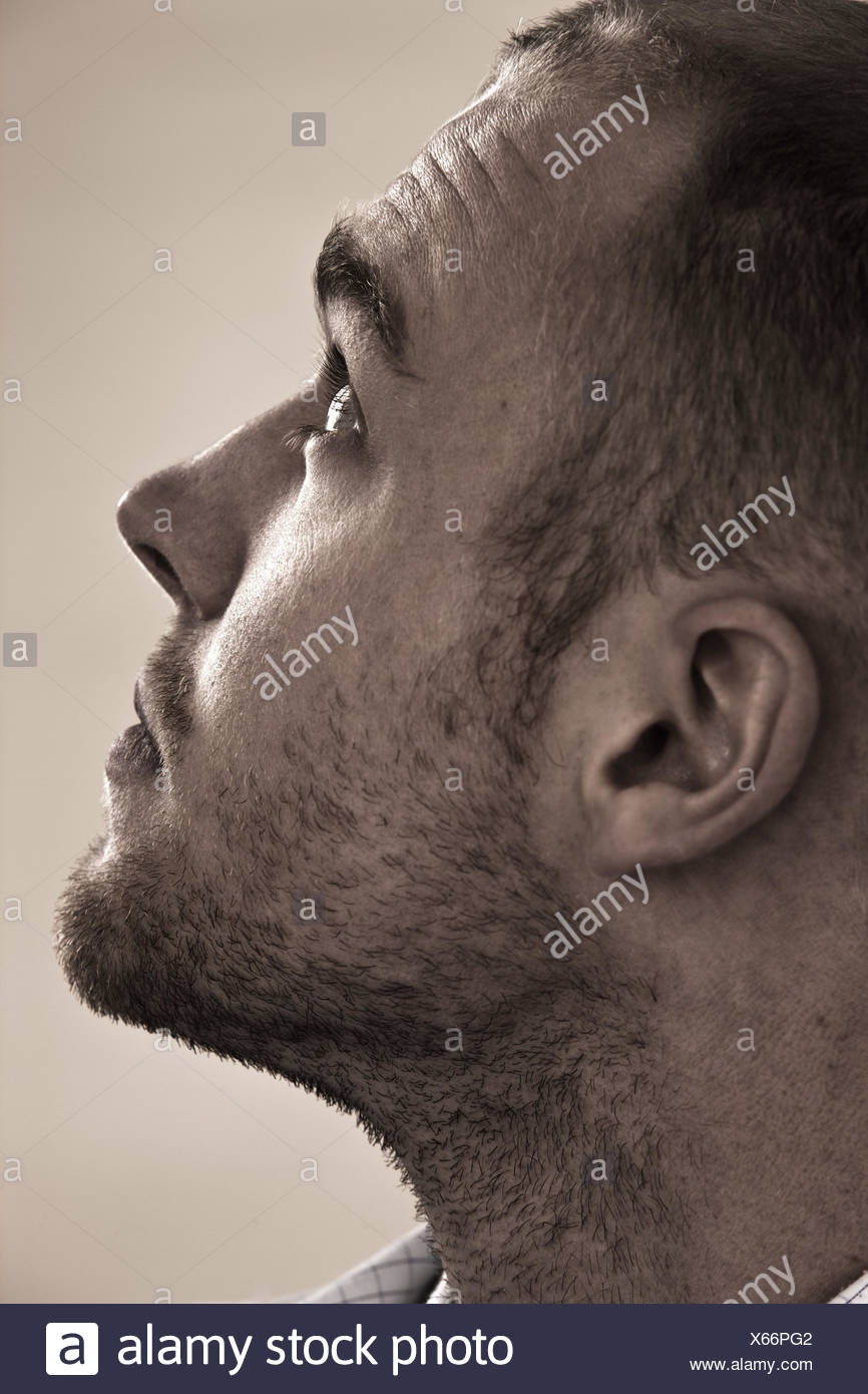 Man Curled Up High Resolution Stock Photography and Images - Alamy