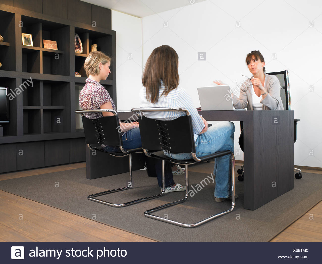 Businesswoman Sitting Desk Legs Up Stock Photos & Businesswoman Sitting ...