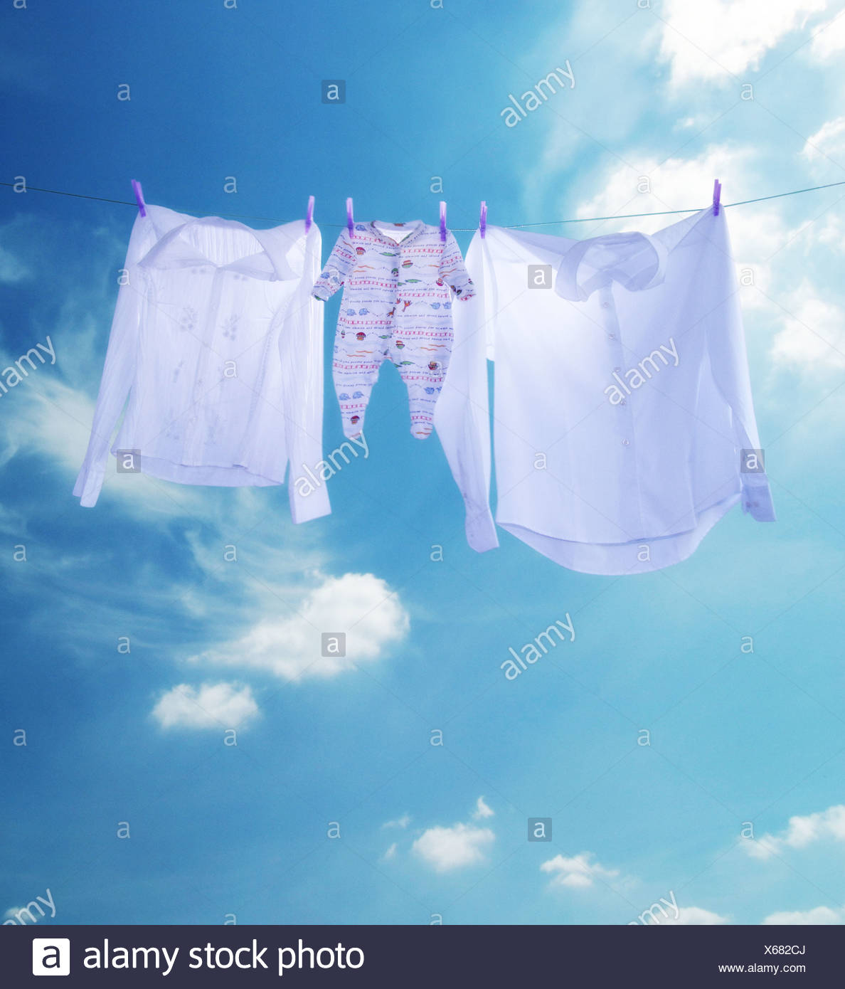 Baby Clothes On Washing Line Stock Photos & Baby Clothes On Washing ...
