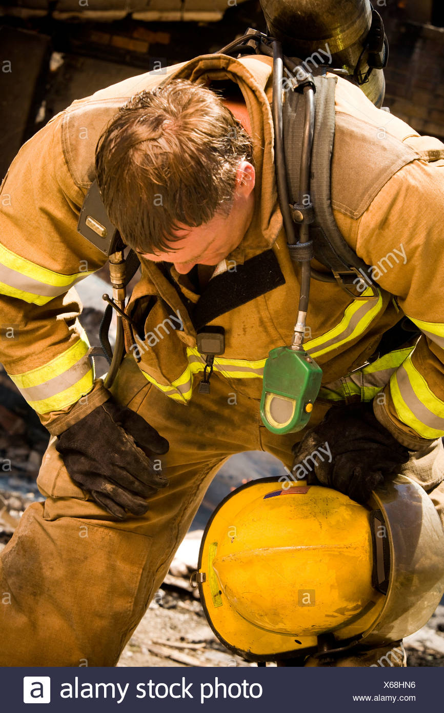 Firefighter Rescue Child Stock Photos & Firefighter Rescue Child Stock Images - Alamy