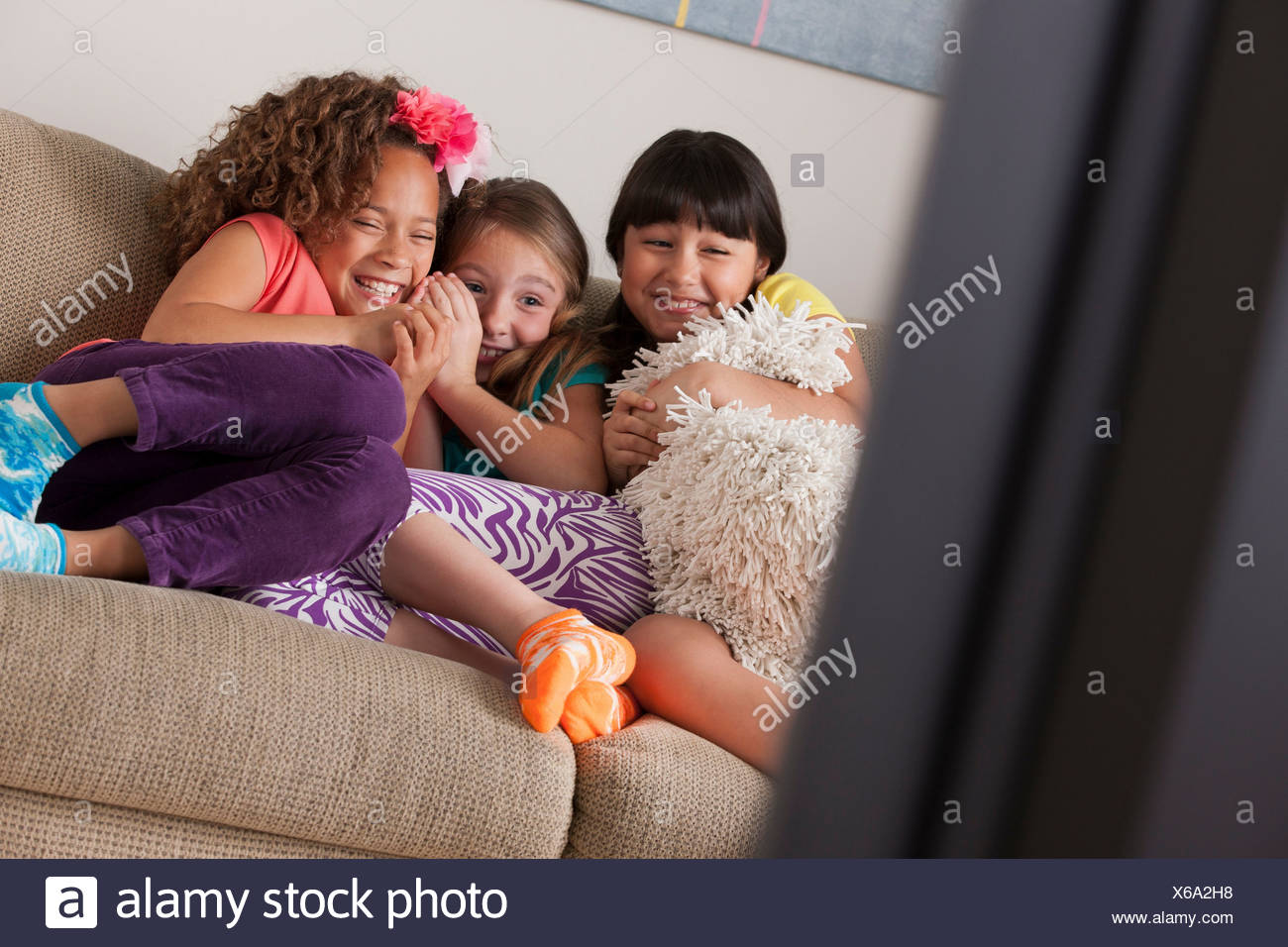 Girls Watching Tv High Resolution Stock Photography and Images - Alamy