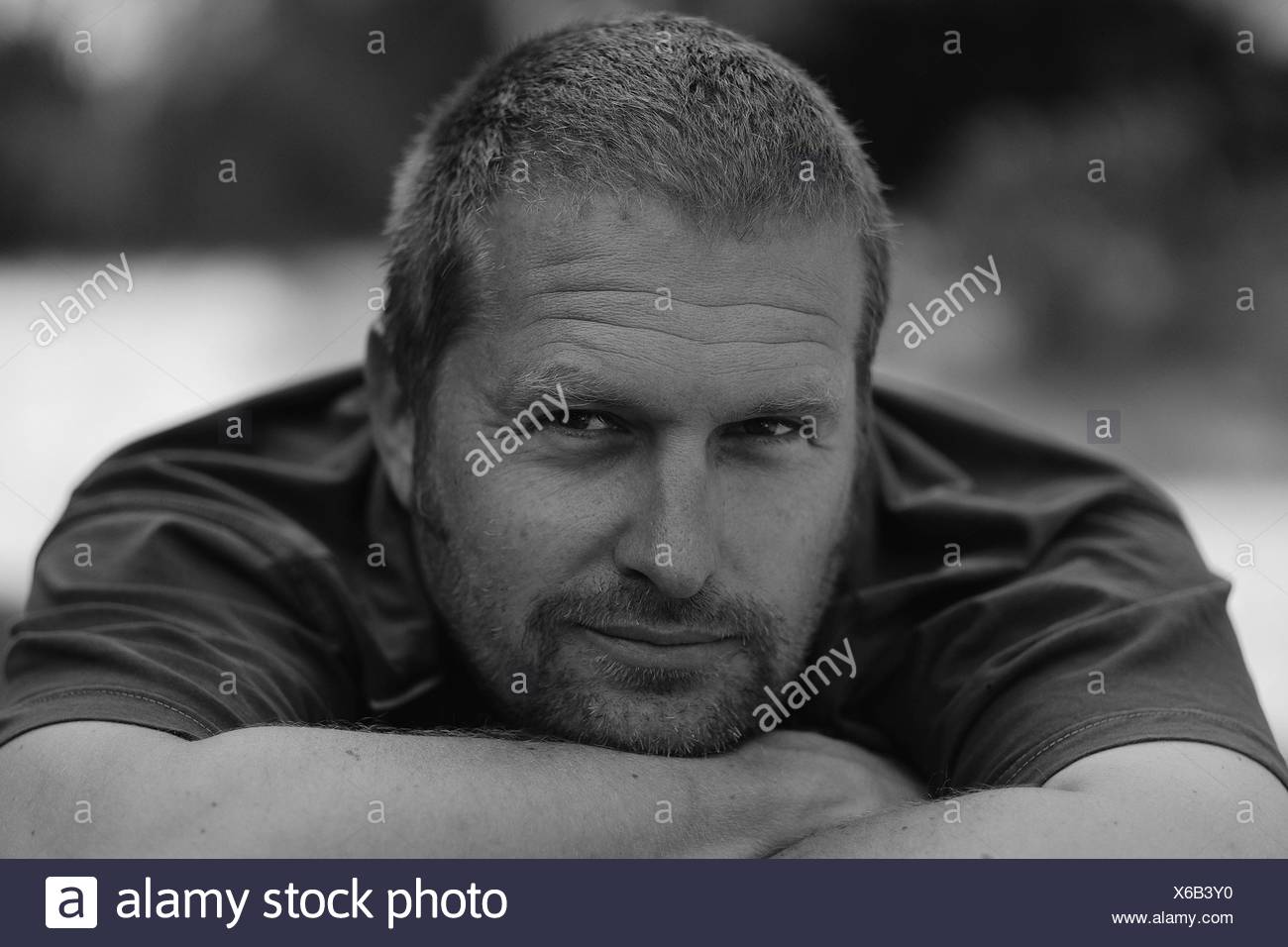 Leaning On Hand Black and White Stock Photos & Images - Alamy