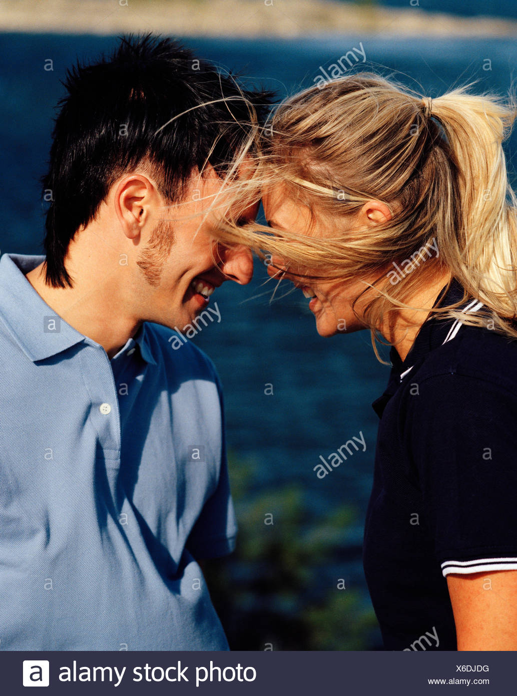 Two People Foreheads Touching Stock Photos & Two People Foreheads ...