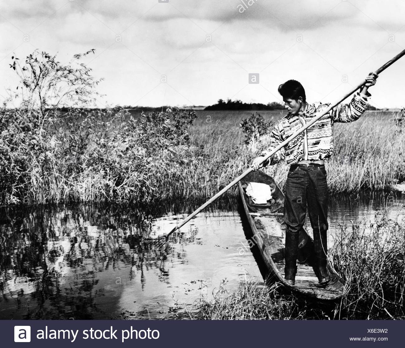 Spear Fishing Black and White Stock Photos & Images - Alamy