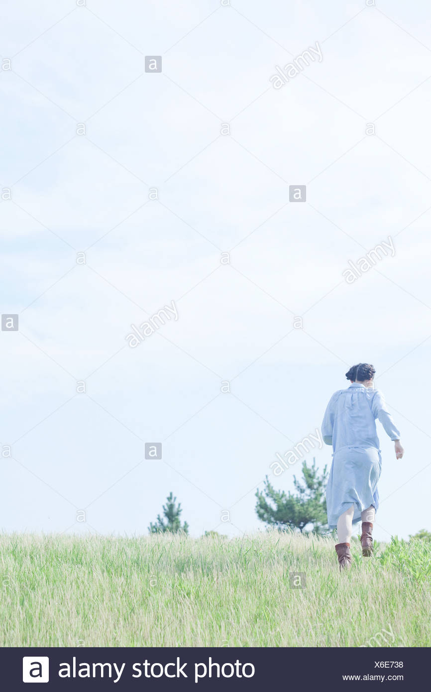 Woman Walking Field Far High Resolution Stock Photography and Images ...