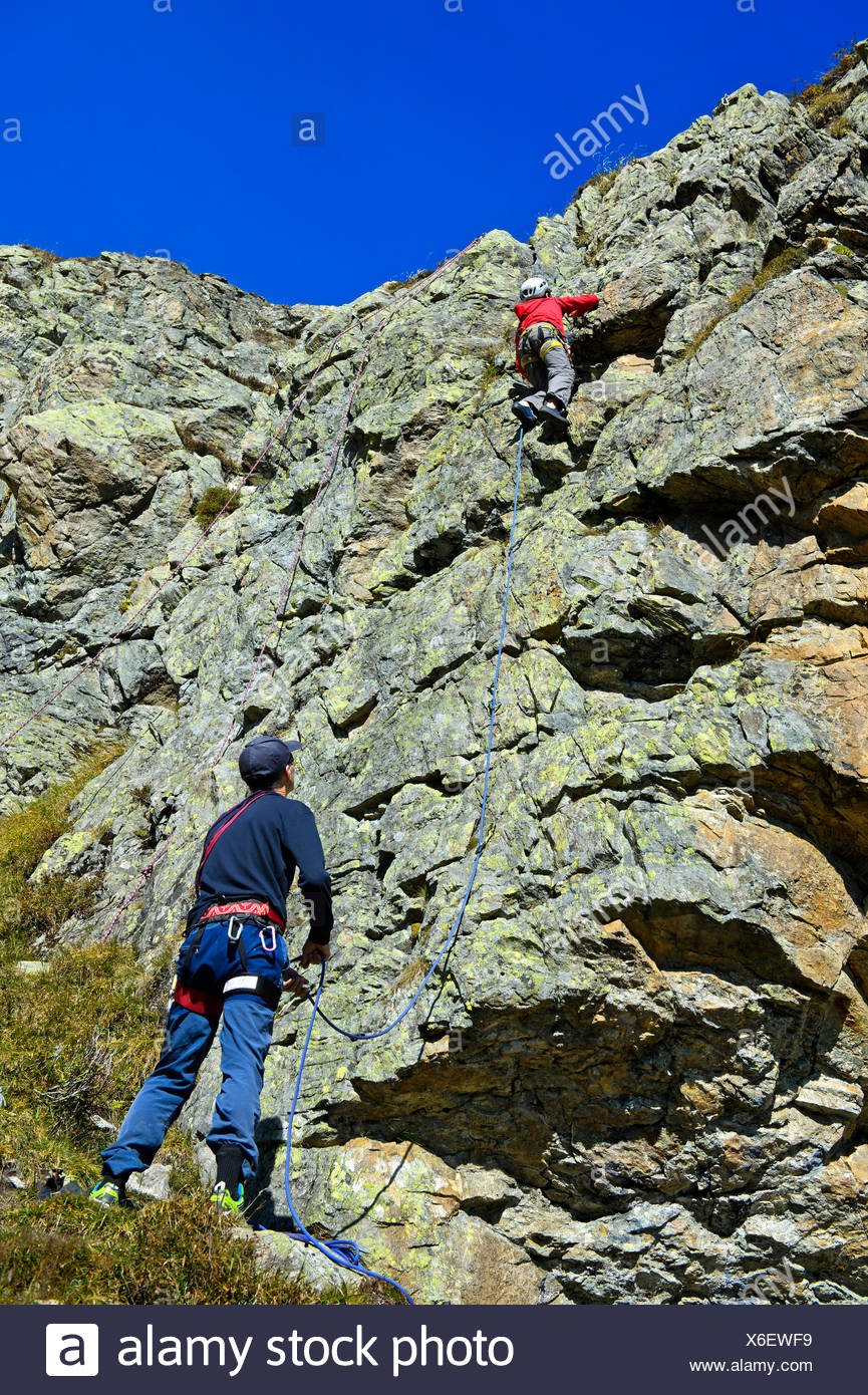 Man Climbing Rock Face High Resolution Stock Photography and Images - Alamy