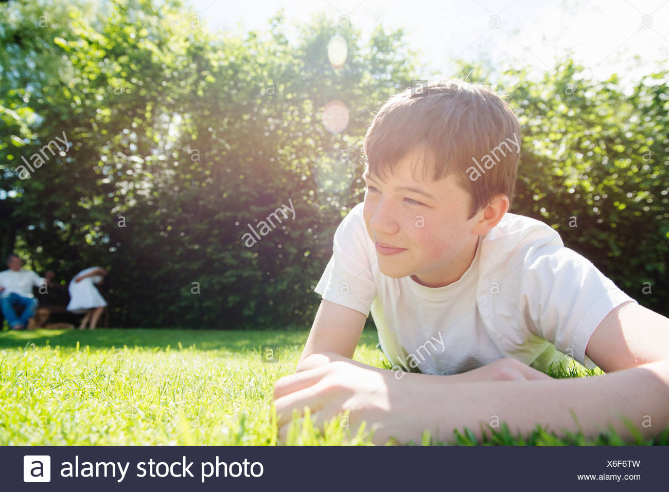 Portrait Of Teenage Boy Lying Grass High Resolution Stock Photography ... Portrait Of Teenage Boy Lying Grass High Resolution Stock Photography ...