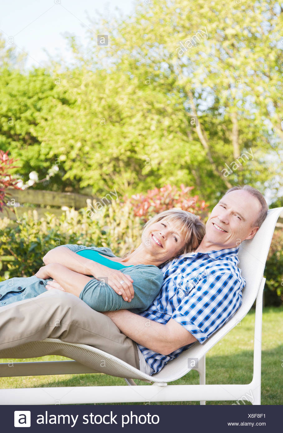 Man Laying On Lounge Chair Stock Photos & Man Laying On Lounge Chair ...