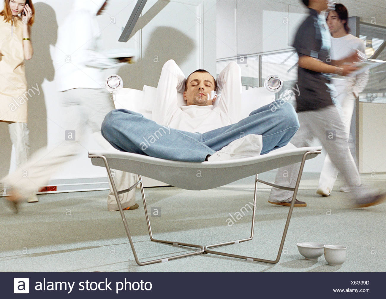Sleeping In Chair High Resolution Stock Photography and Images - Alamy