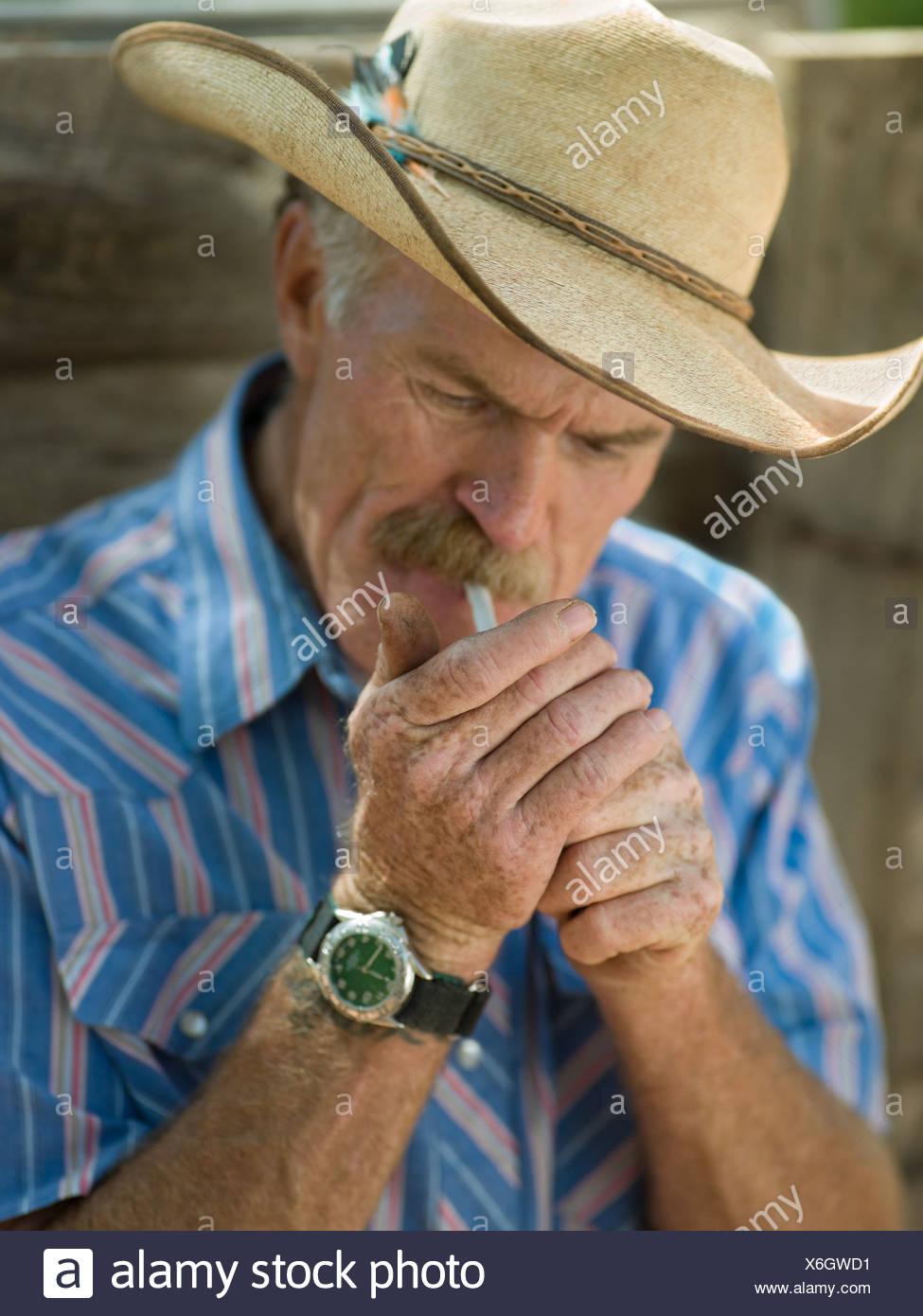 Cowboy Smoking Cigarette Stock Photos & Cowboy Smoking Cigarette Stock ...