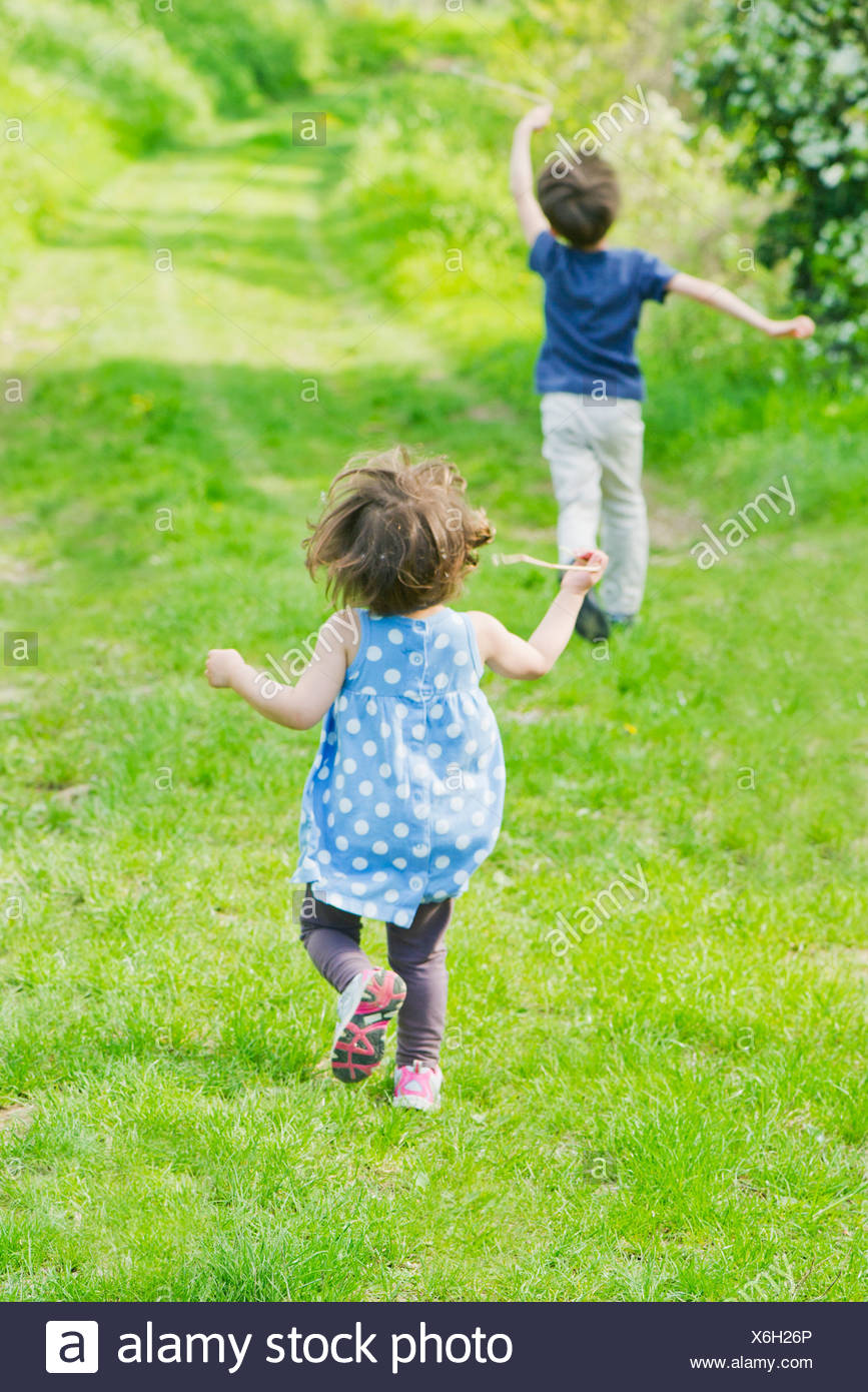 Boy Running Back High Resolution Stock Photography and Images - Alamy