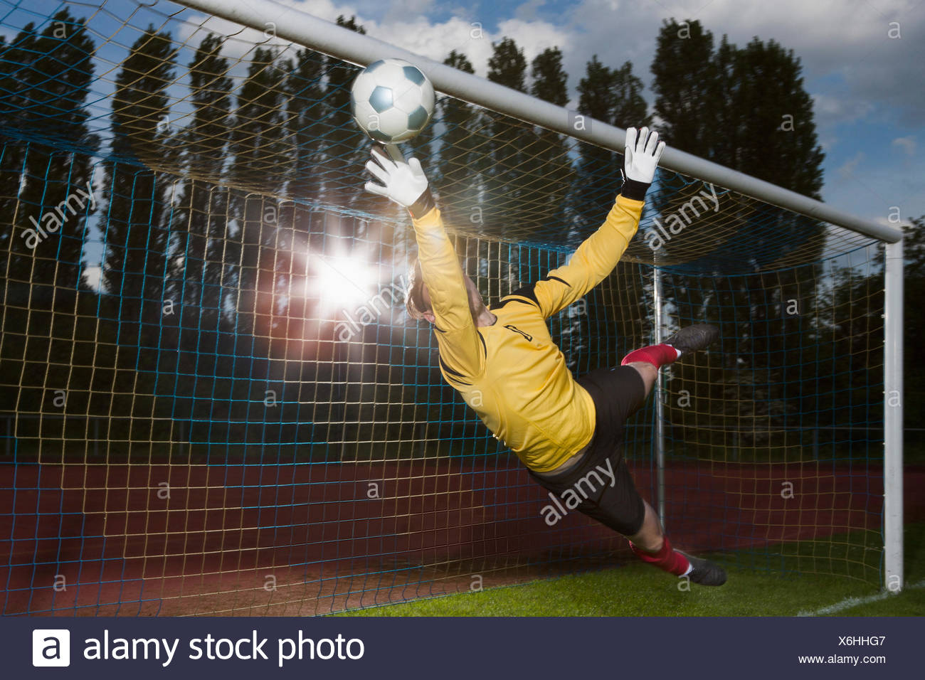 Soccer Goalie Jumping High Resolution Stock Photography and Images - Alamy