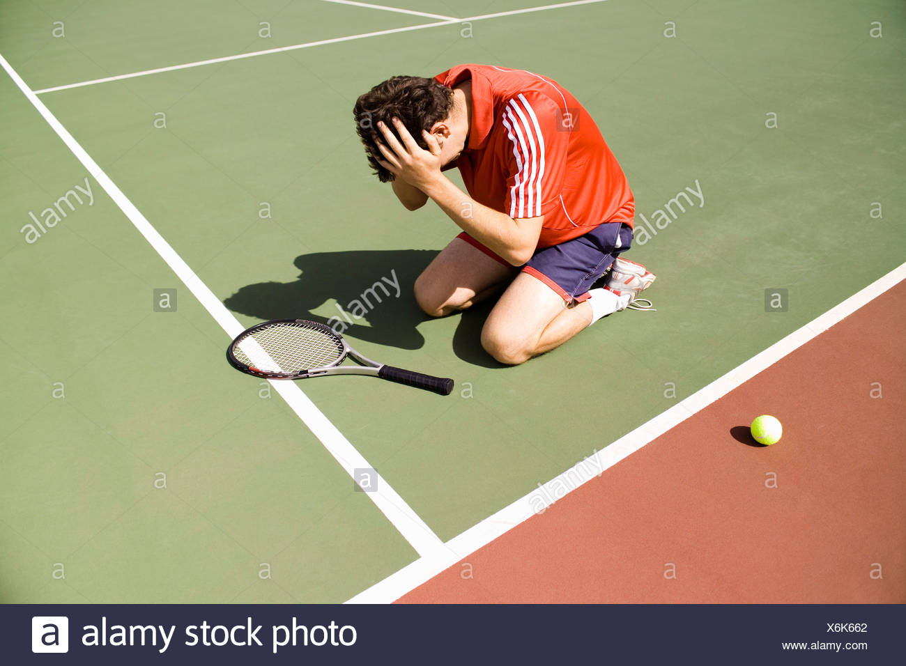 Red Crouching Men High Resolution Stock Photography and Images - Alamy