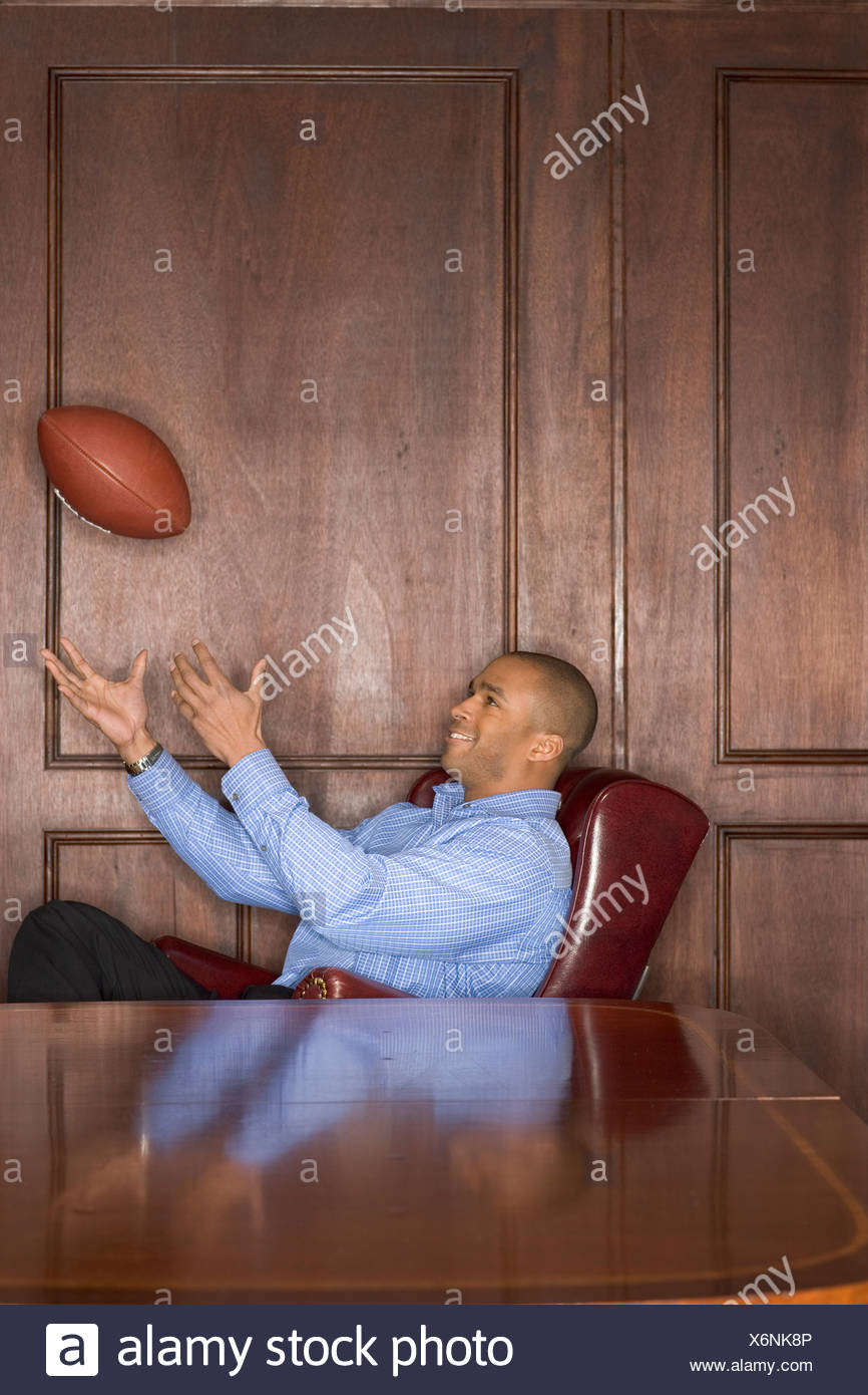 Man Throwing Chair Stock Photos & Man Throwing Chair Stock Images - Alamy