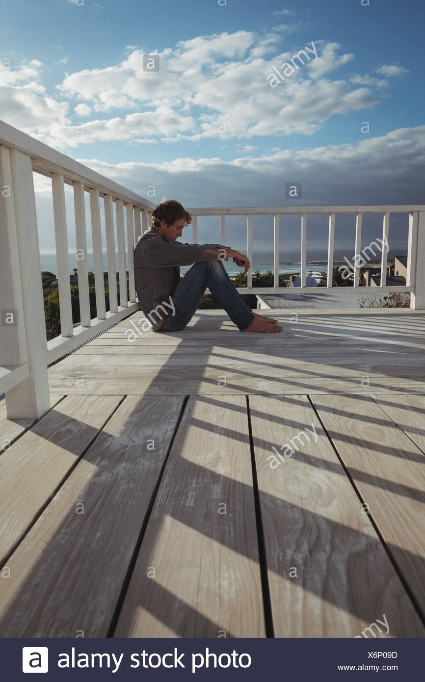 Man Sitting On Balcony High Resolution Stock Photography and Images - Alamy