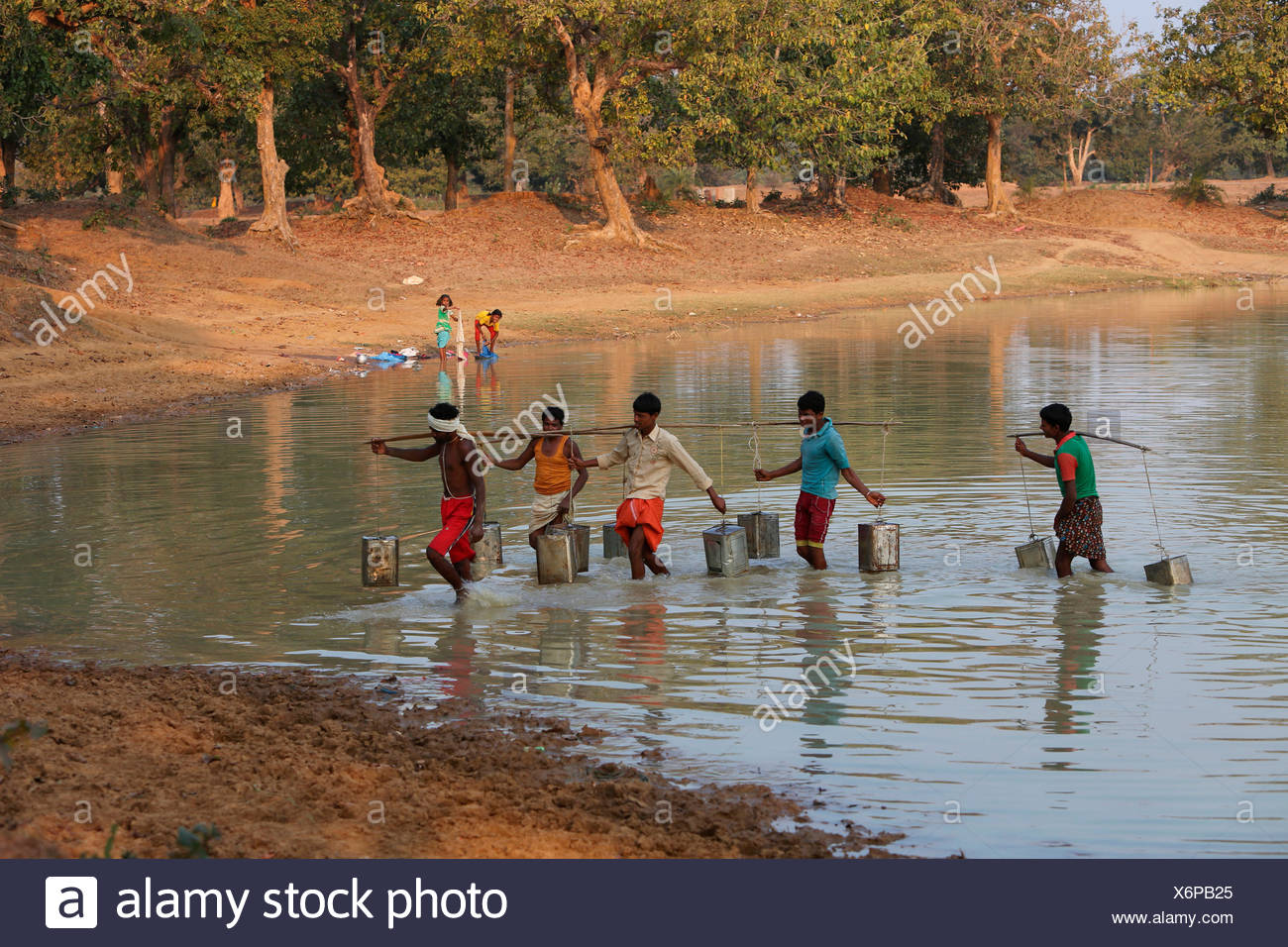People Fetching Water High Resolution Stock Photography and Images - Alamy