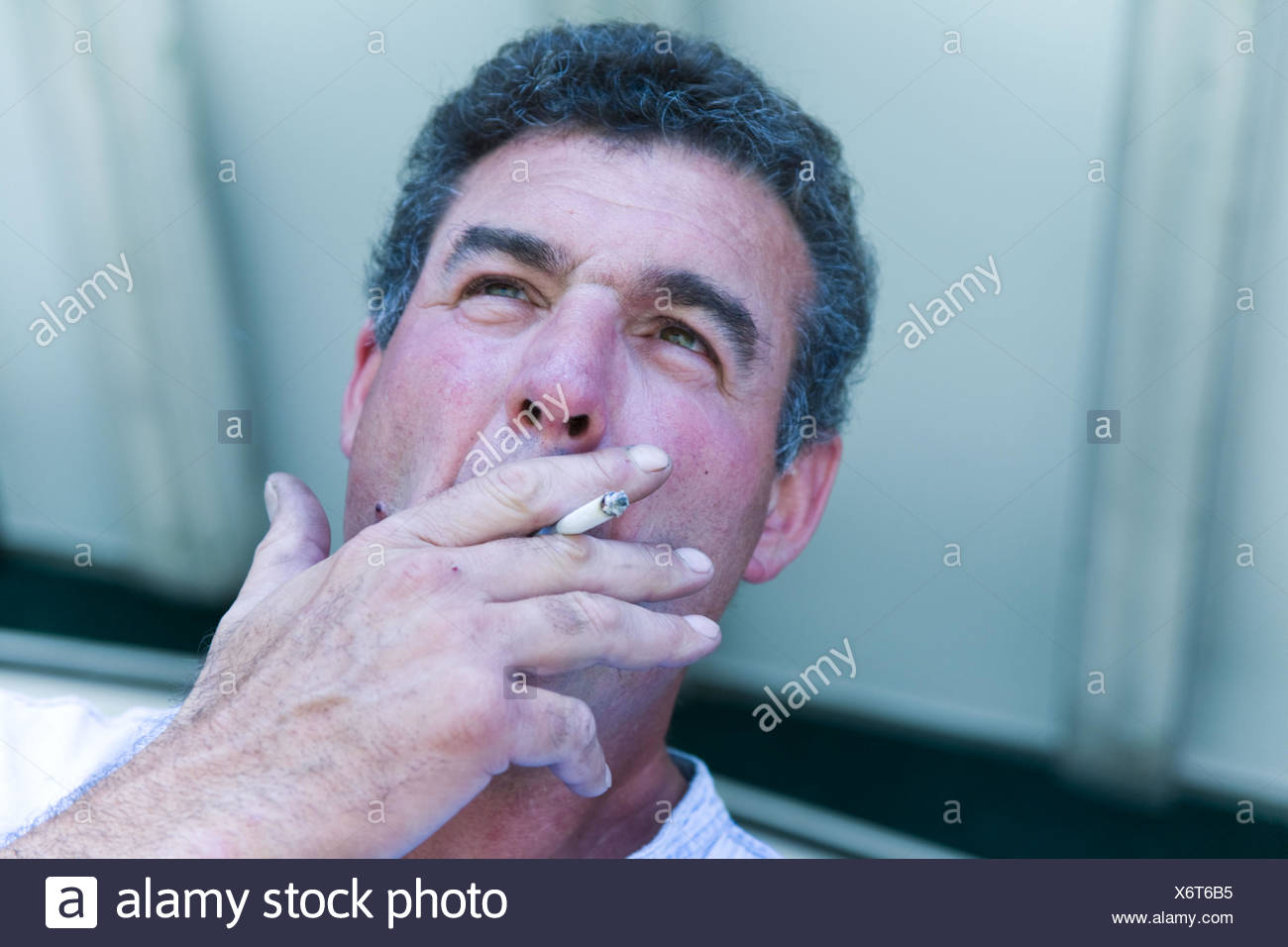 Middle Age Man Smoking Cigarette High Resolution Stock Photography and ...