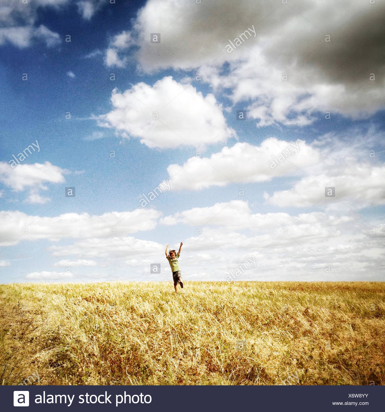 Boys Running Through Field High Resolution Stock Photography and Images ...