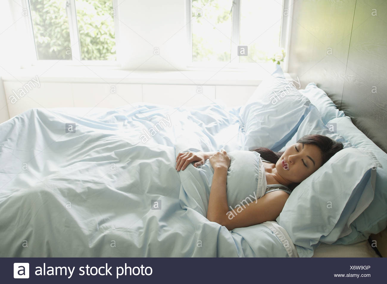 Sleeping Woman In Bed Full Body High Resolution Stock Photography and ...
