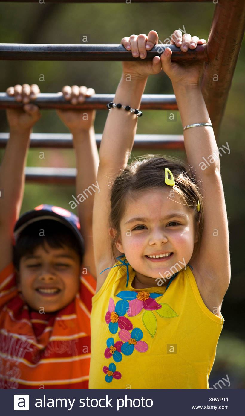 Kids Hanging On Monkey Bars High Resolution Stock Photography and ...
