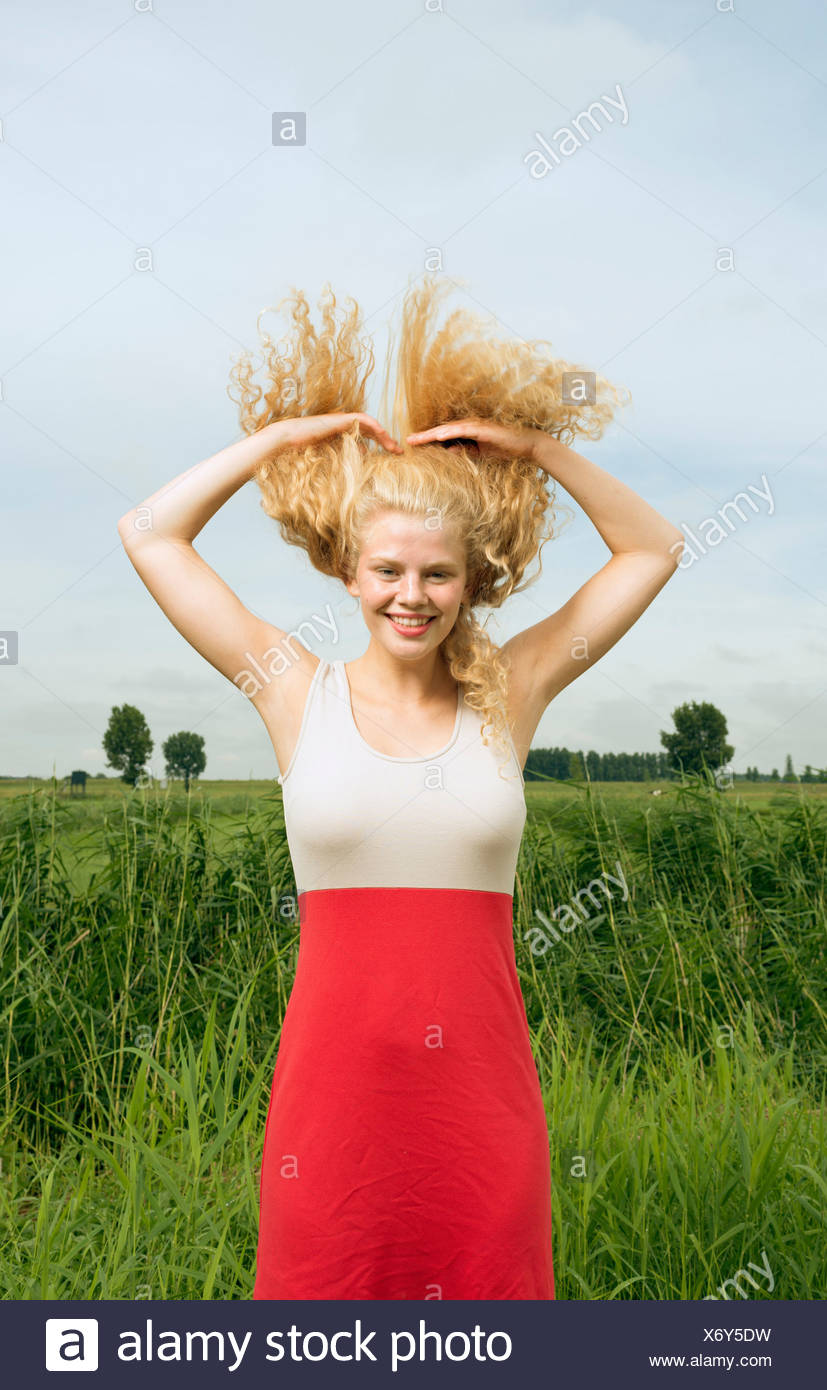 Woman Throwing Back Hair High Resolution Stock Photography and Images ...