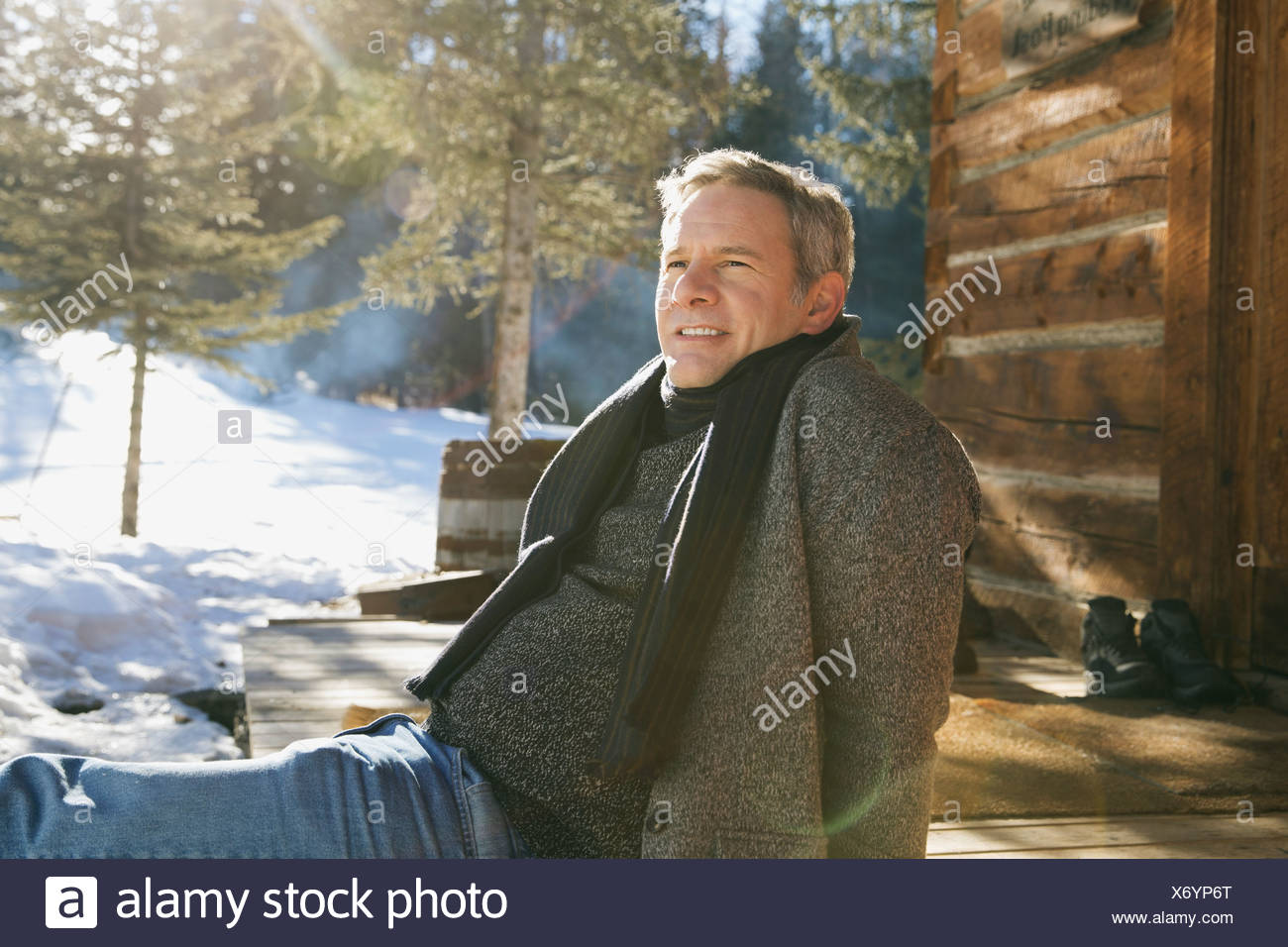 Man Sitting On Log On Stock Photos & Man Sitting On Log On Stock Images ...