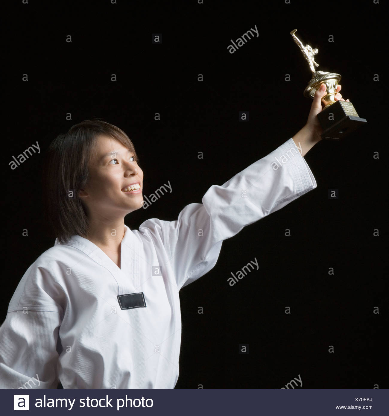 Black Holding Trophy High Resolution Stock Photography and Images - Alamy