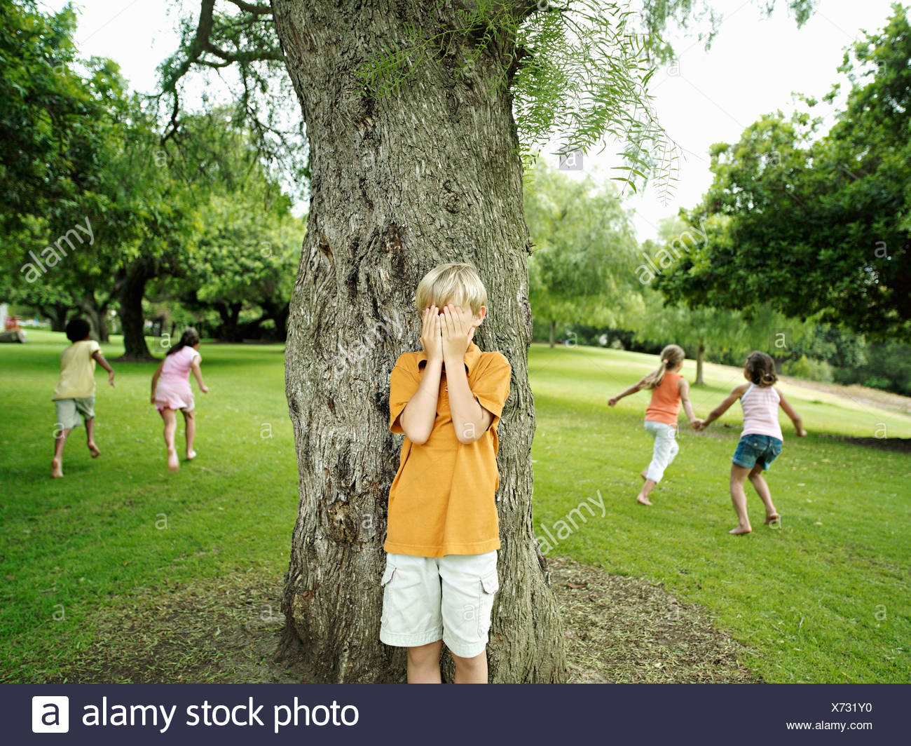 Hide And Seek With Friends Stock Photos & Hide And Seek With Friends Stock Images - Alamy