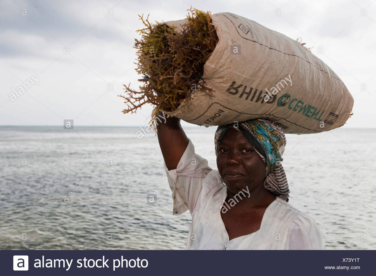 Woman Carrying A Sack High Resolution Stock Photography and Images - Alamy