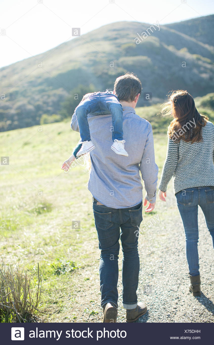 Man Carrying Woman Over Shoulder High Resolution Stock Photography and ...
