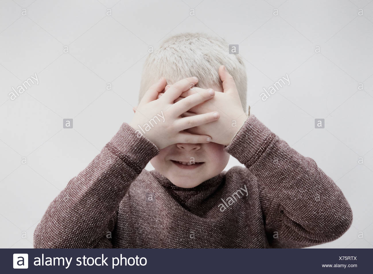 Boy Covers Face High Resolution Stock Photography and Images - Alamy