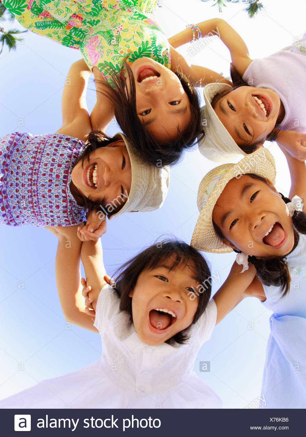 Girls In Huddle Looking At Camera High Resolution Stock Photography and ...
