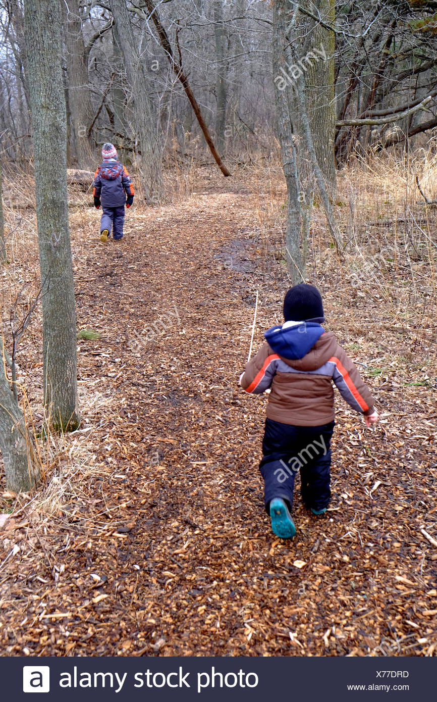 Two Boys Walk Along Path Stock Photos & Two Boys Walk Along Path Stock ...