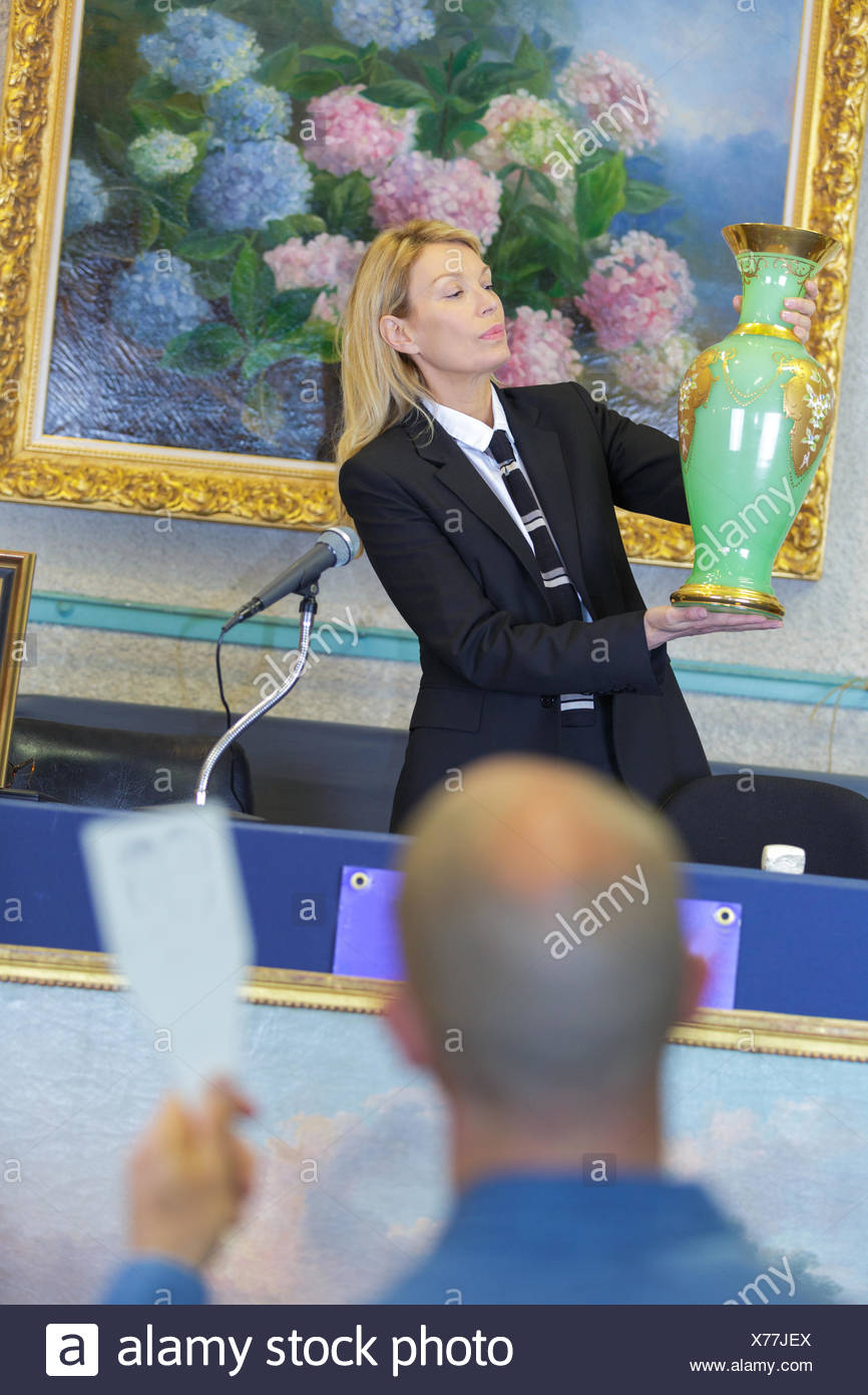 Female Auctioneer High Resolution Stock Photography and Images - Alamy