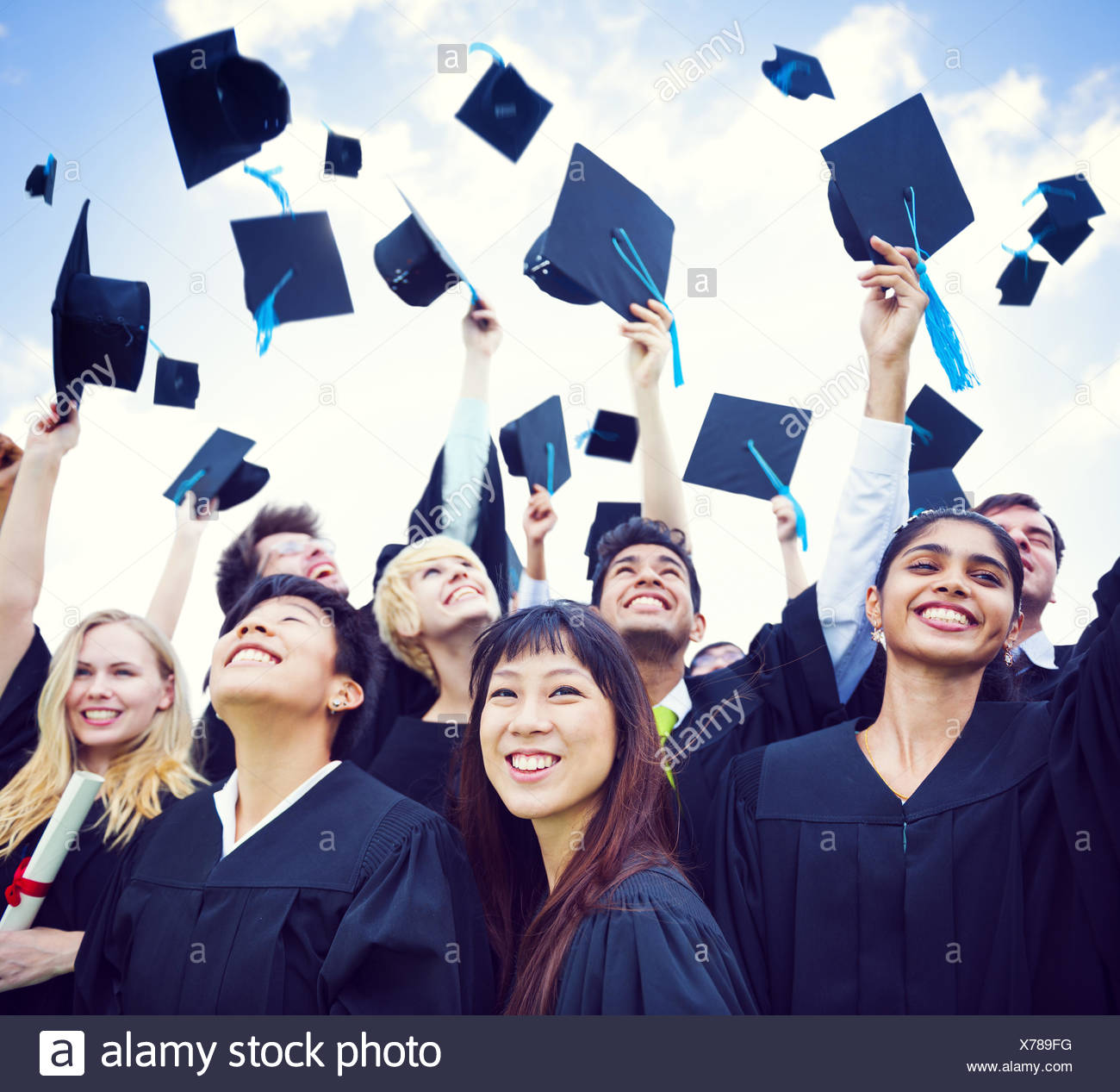 Graduation Caps Thrown Air High Resolution Stock Photography and Images ...