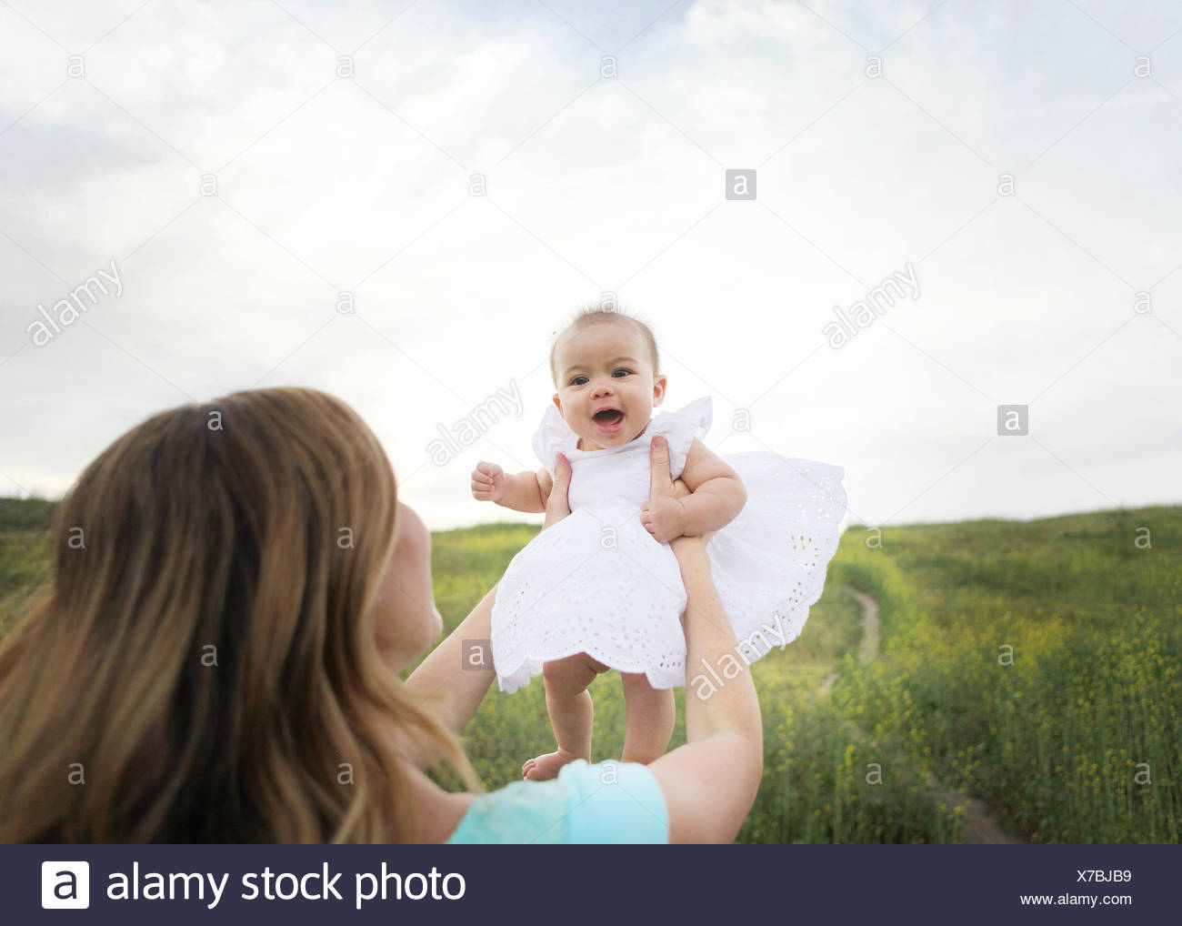 Child Lifting Arms High Resolution Stock Photography and Images - Alamy